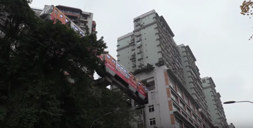 WATCH: Chinese train passes through apartment building | Inquirer ...