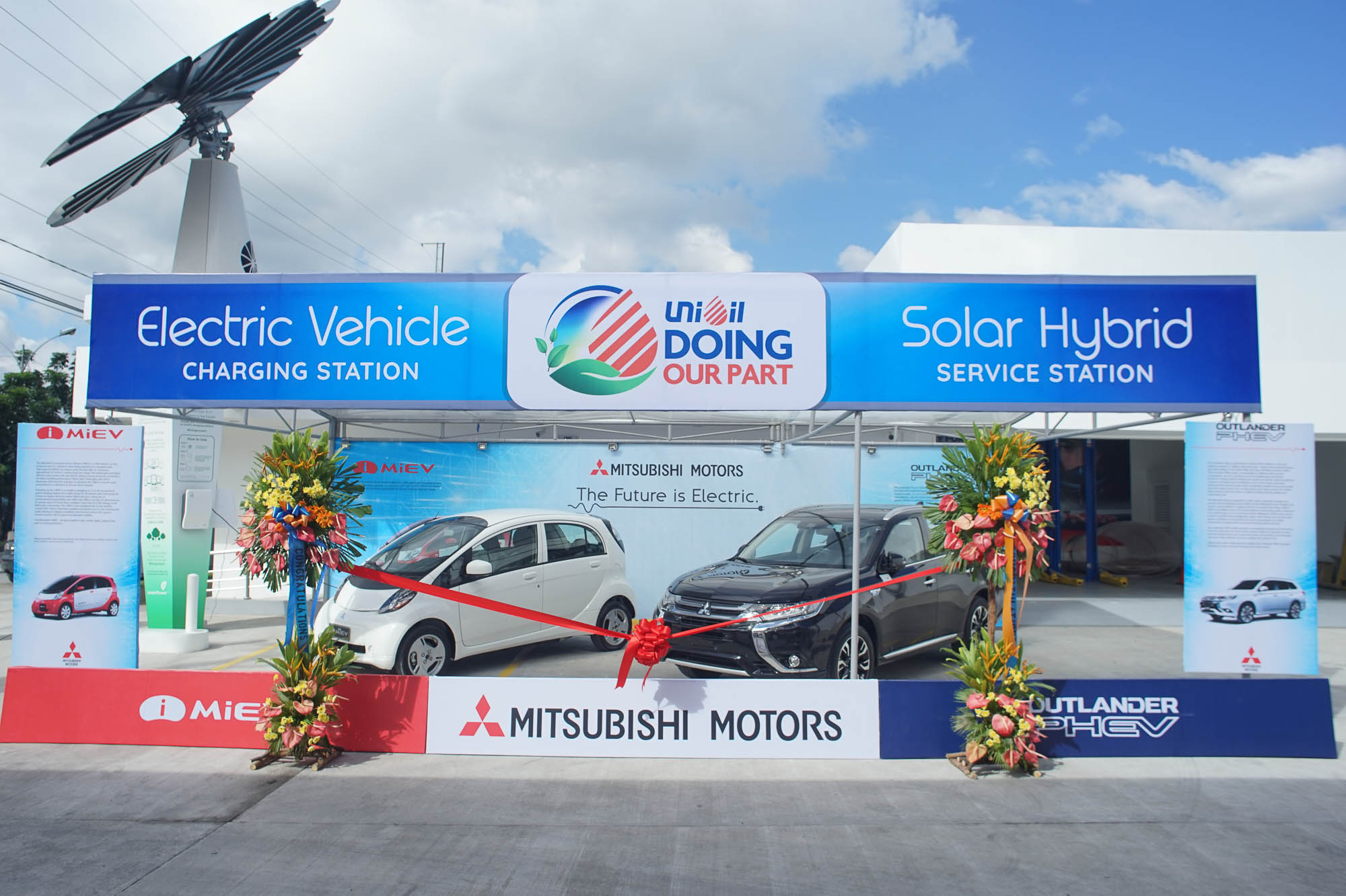 Unioil opens its first electric vehicle charging station | Inquirer ...