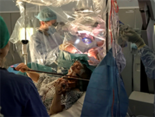 Musician plays violin during brain surgery | Inquirer Technology